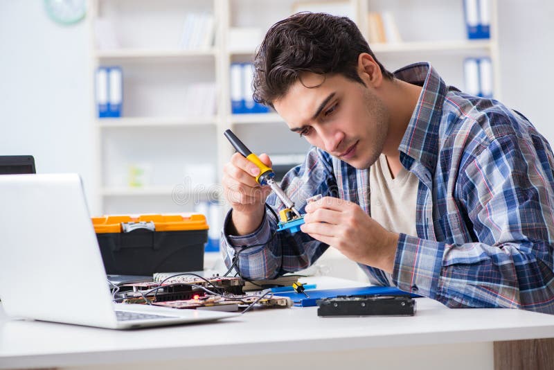 Computer Hardware Repair and Fixing Concept by Experienced Techn Stock ...
