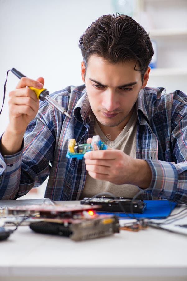 Computer Hardware Repair and Fixing Concept by Experienced Techn Stock ...