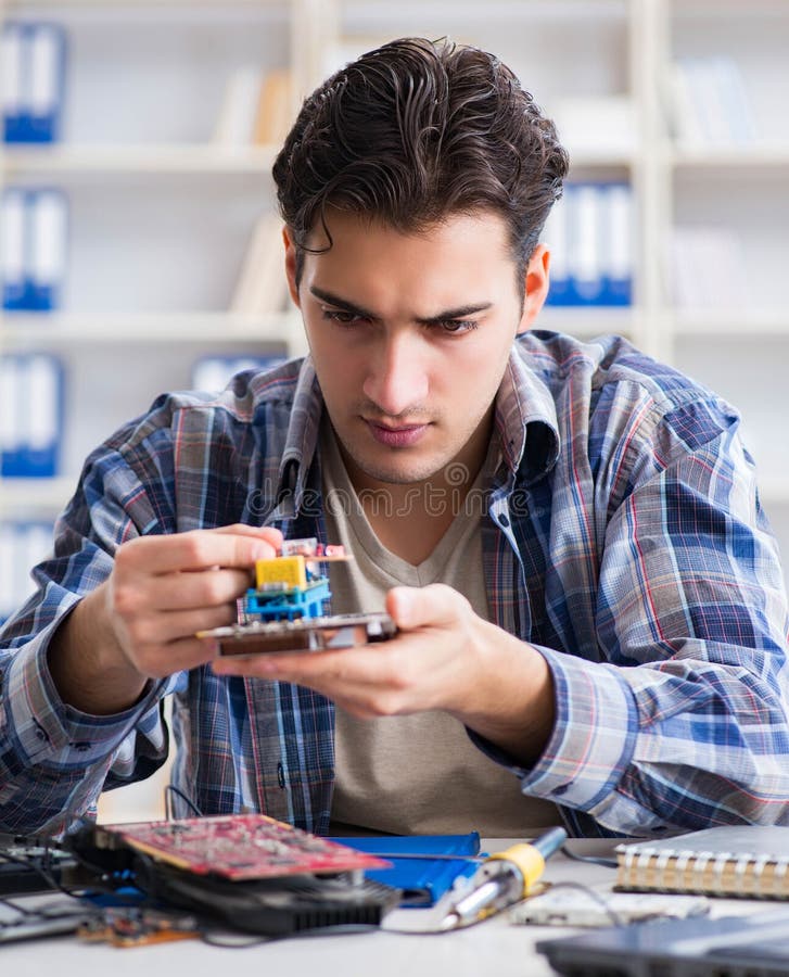 Computer Hardware Repair and Fixing Concept by Experienced Techn Stock ...