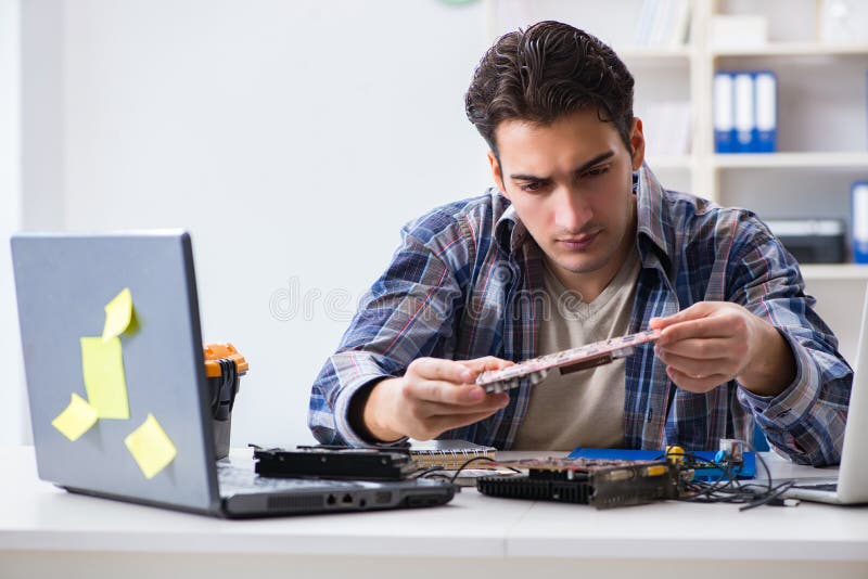 Computer Hardware Repair and Fixing Concept by Experienced Techn Stock ...