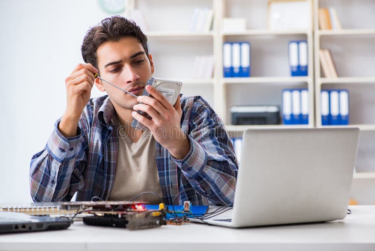 Computer Hardware Repair and Fixing Concept by Experienced Techn Stock ...