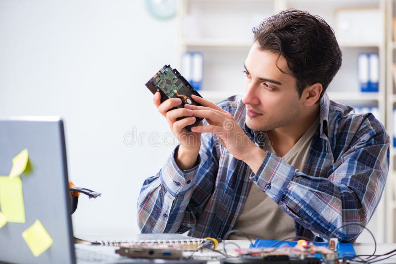 Computer Hardware Repair and Fixing Concept by Experienced Techn Stock ...
