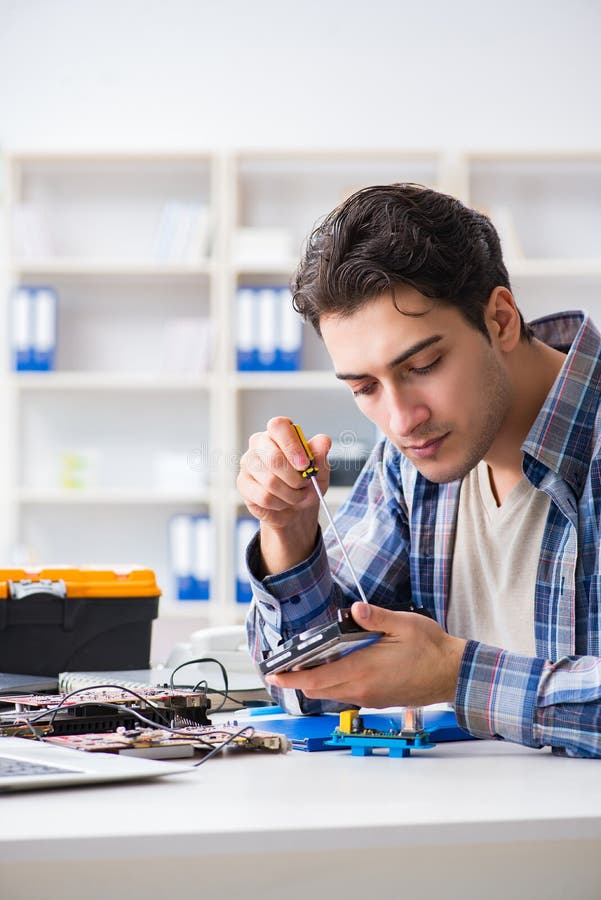 Computer Hardware Repair and Fixing Concept by Experienced Techn Stock ...