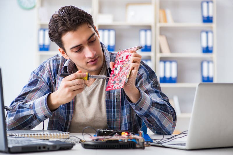 Computer Hardware Repair and Fixing Concept by Experienced Techn Stock ...