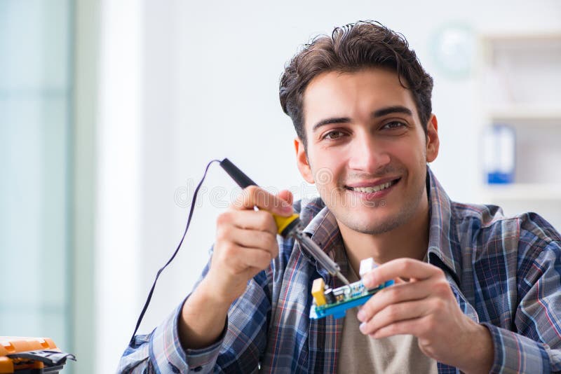 Computer Hardware Repair and Fixing Concept by Experienced Techn Stock ...