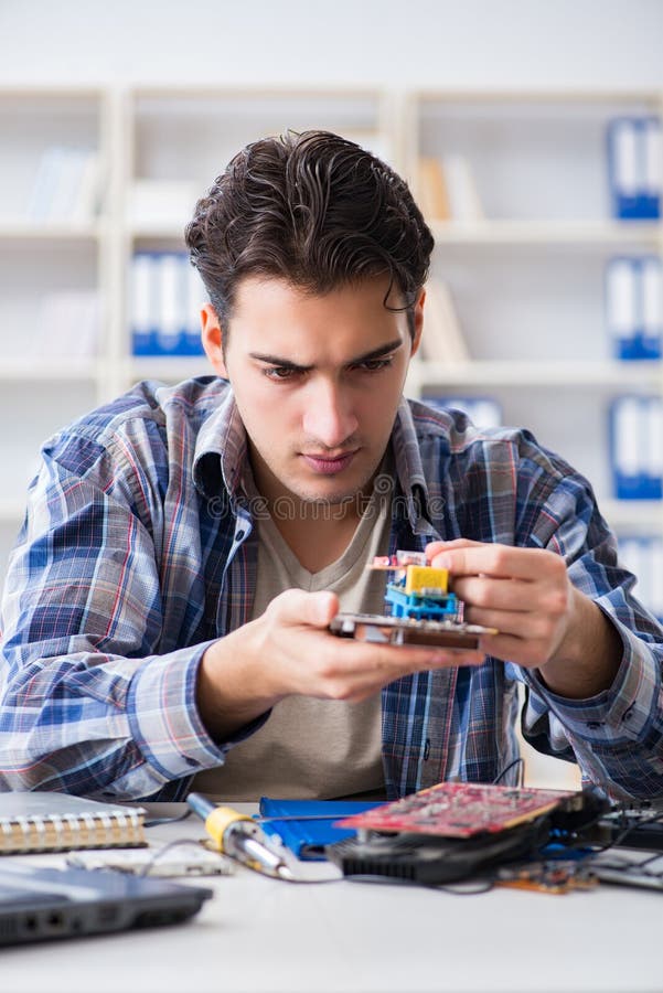 Computer Hardware Repair and Fixing Concept by Experienced Techn Stock ...
