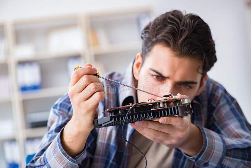 Computer Hardware Repair and Fixing Concept by Experienced Techn Stock ...