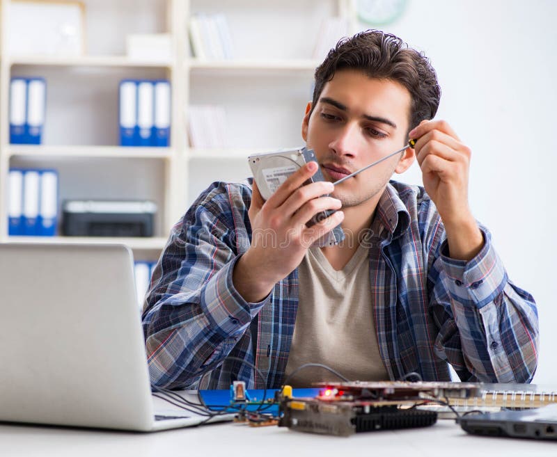 Computer Hardware Repair and Fixing Concept by Experienced Techn Stock ...