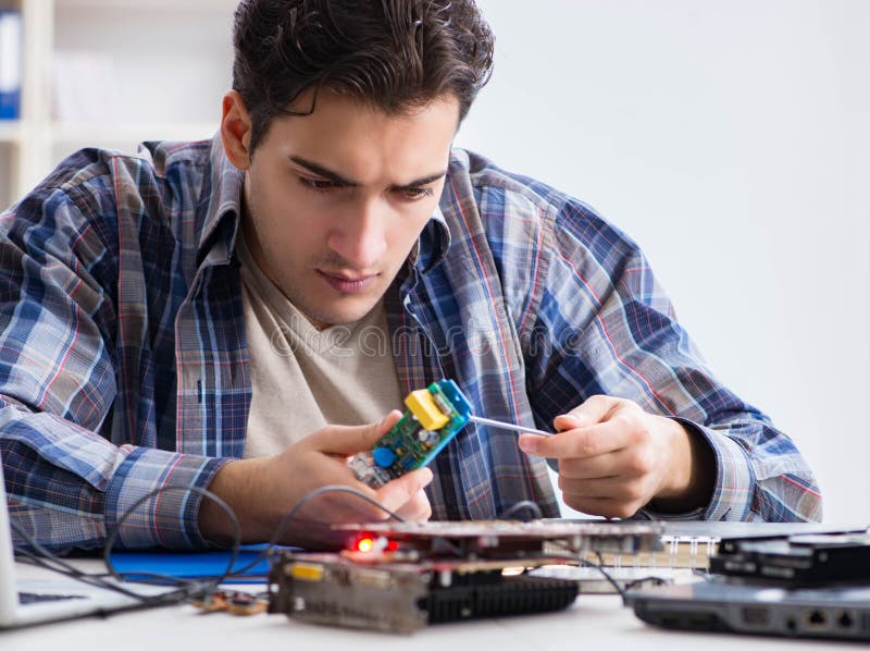 Computer Hardware Repair and Fixing Concept by Experienced Techn Stock ...