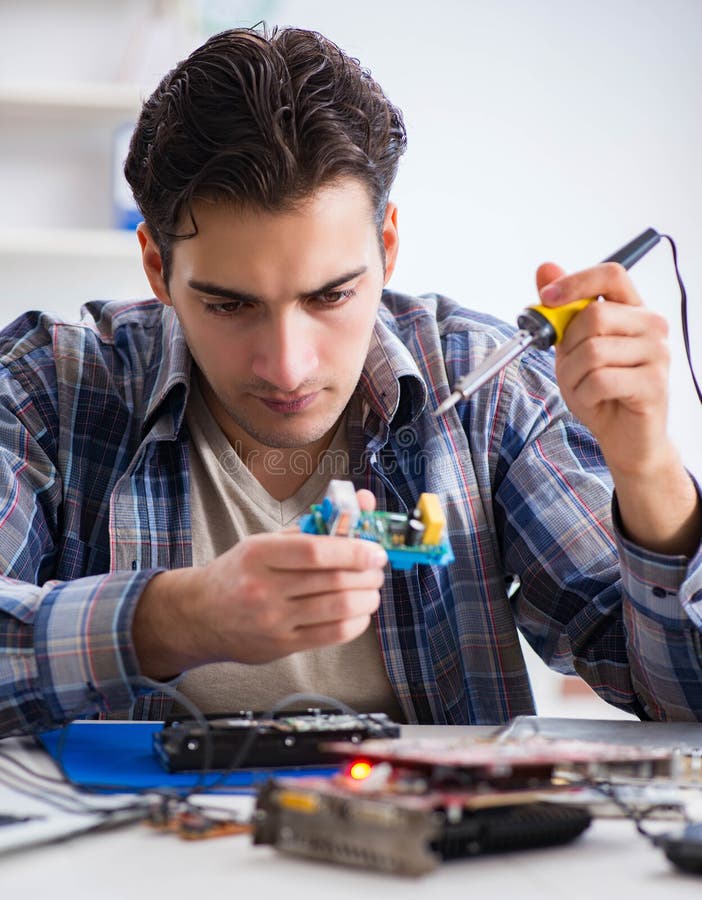 Computer Hardware Repair and Fixing Concept by Experienced Techn Stock ...