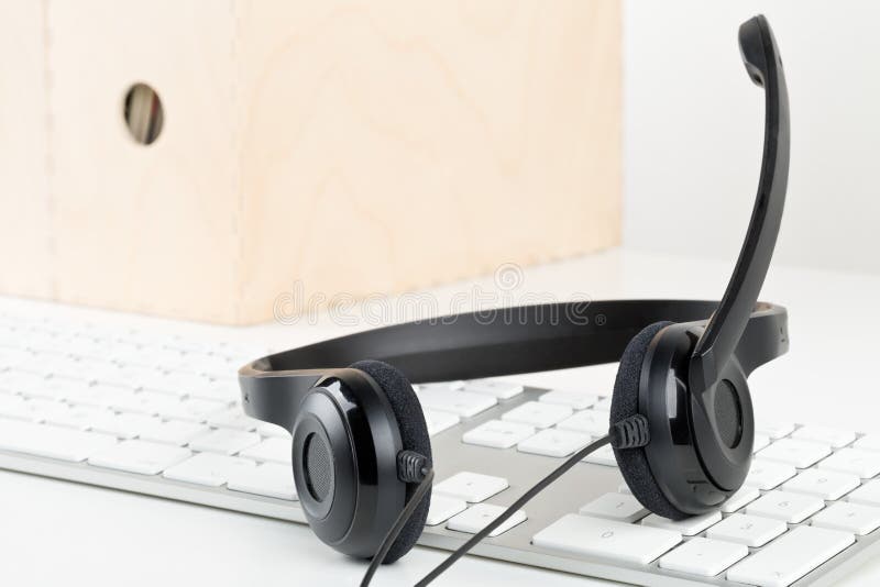 Computer Headset with Microphone on Computer Keyboard on White T Stock ...