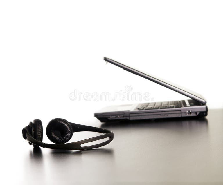 Computer and Headset on the Table, Nothing Else. Stock Image - Image of ...