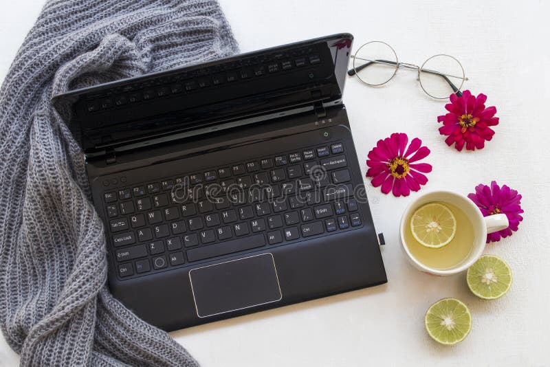 Computer with Healthy Drinks Honey Lemon and Knitting Wool Scarf Stock ...