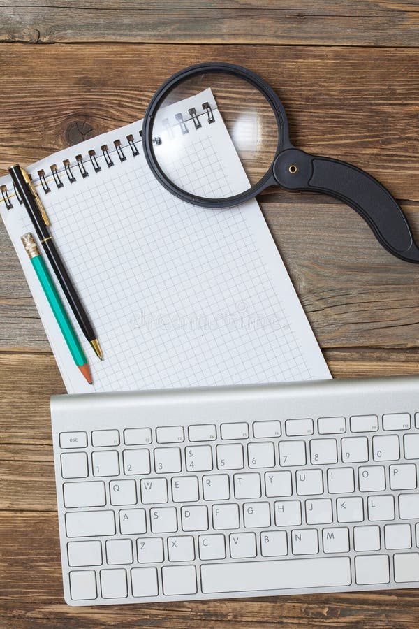 Computer Keyboard, Ballpoint Pen, Pencil, Notepad And Magnifying Stock ...