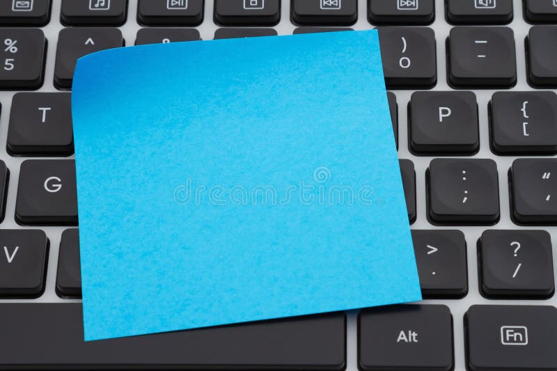 Computer Keyboard with a Blank Blue Sticky Note Stock Image - Image of ...