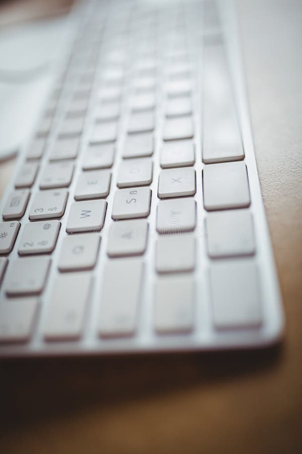 Computer keyboard on desk stock photo. Image of technology - 77697834