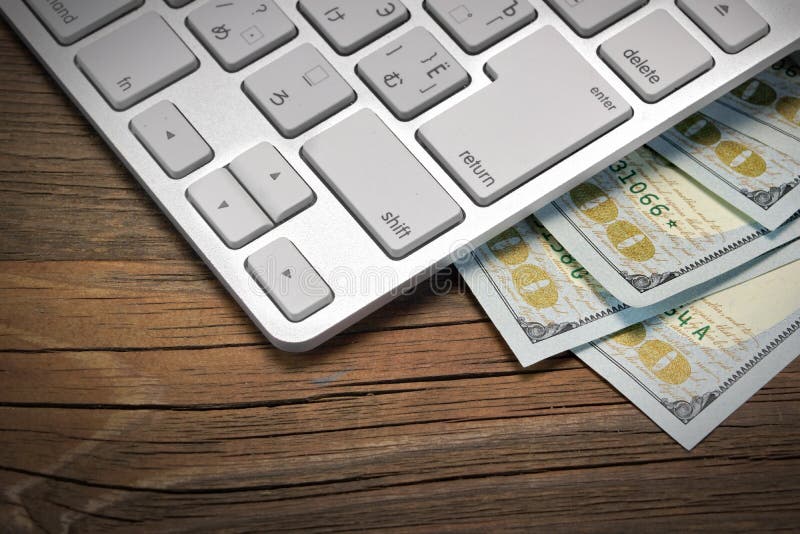 Computer Keyboard and Dollar Cash on the Wood Background Stock Image ...