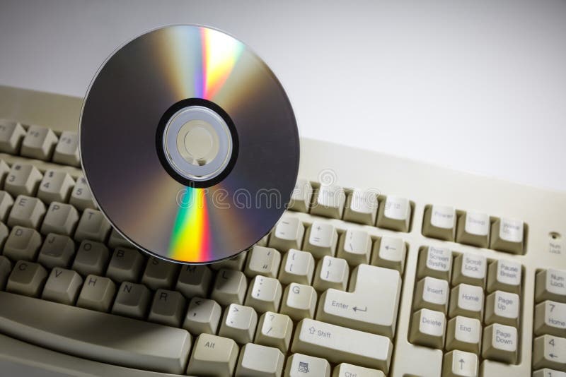 Computer Keyboard and DVD Disk Stock Image - Image of optical ...