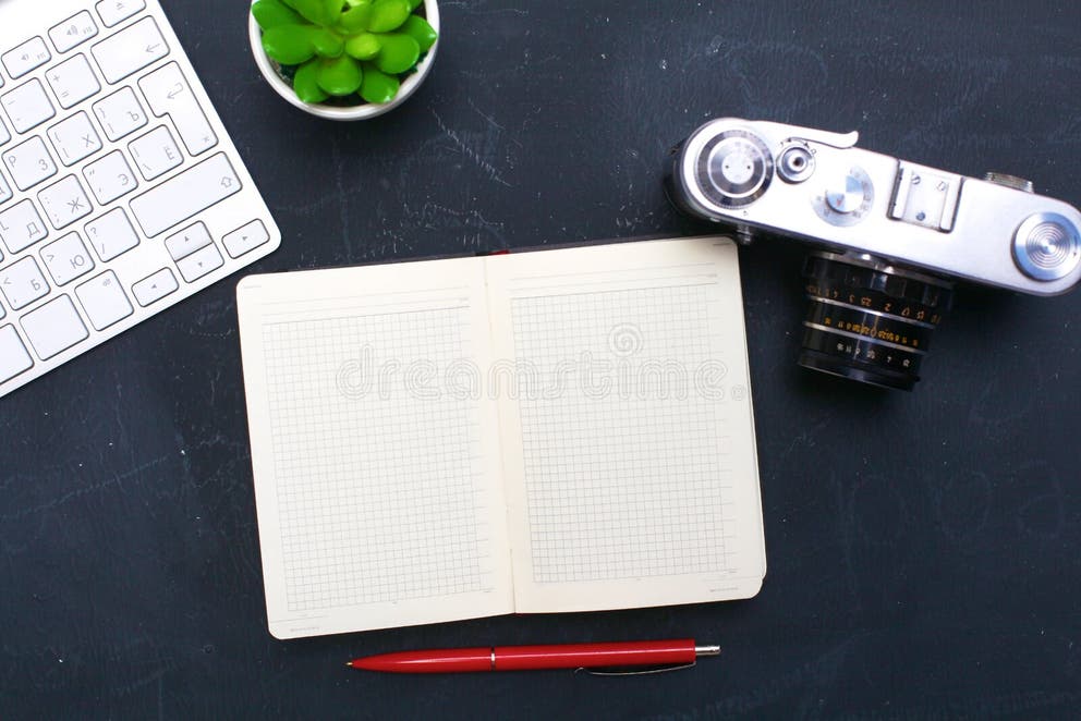 Computer Keyboard, Mouse and Camera Lie on a Black Table Stock Photo ...