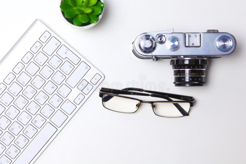 Computer Keyboard, Mouse and Camera Lie on Table Stock Image - Image of ...