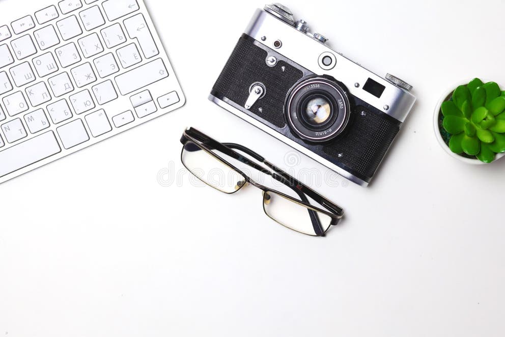 Computer Keyboard, Mouse and Camera Lie on Table Stock Photo - Image of ...