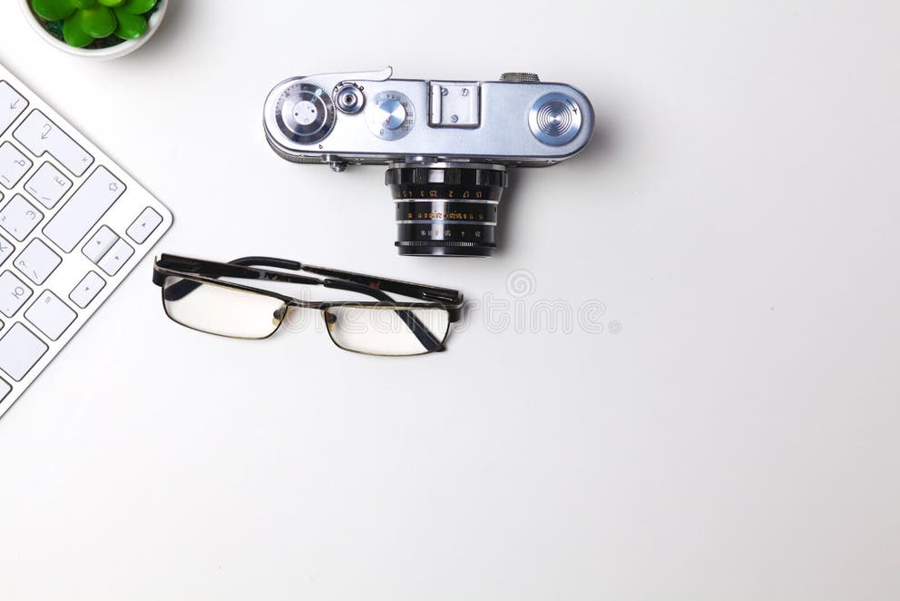 Computer Keyboard, Mouse and Camera Lie on Table Stock Image - Image of ...