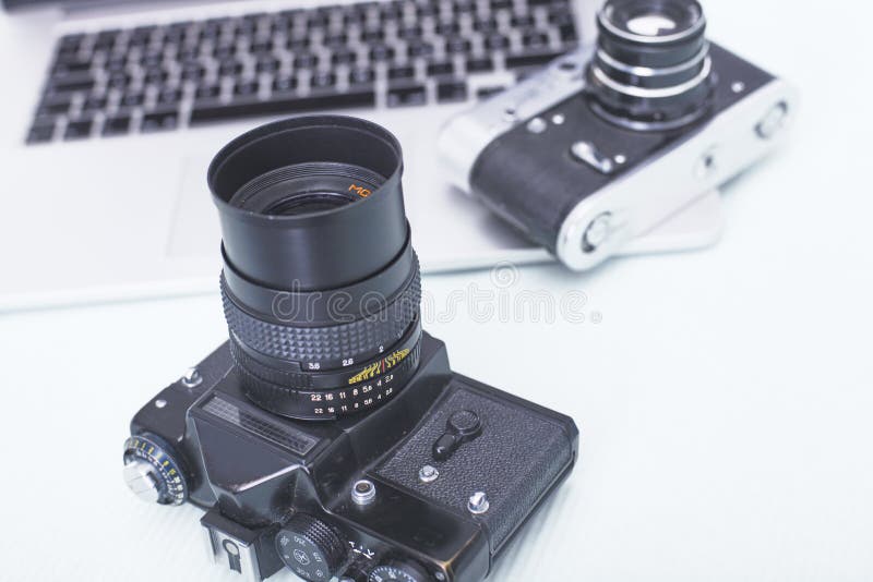 Computer Keyboard, Mouse and Camera Lie on a White Table Stock Image ...