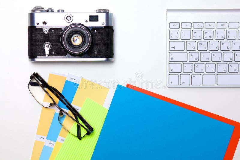 Computer Keyboard, Mouse and Camera Lie on a White Table Stock Image ...