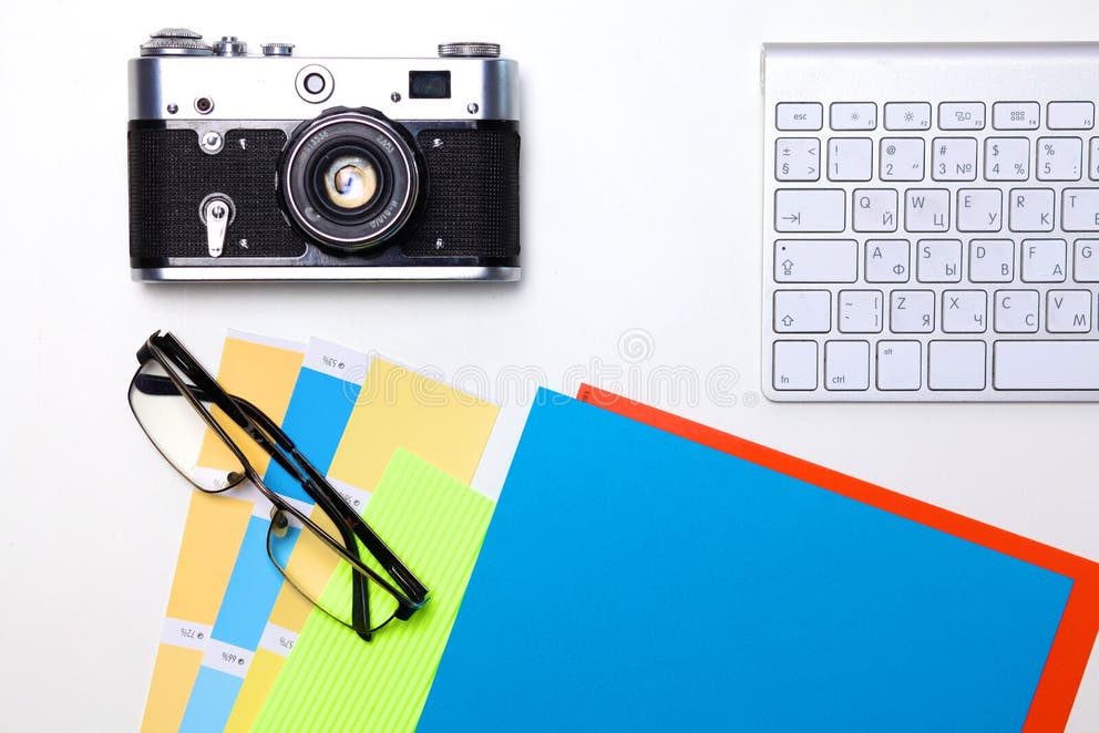 Computer Keyboard, Mouse and Camera Lie on a White Table Stock Image ...