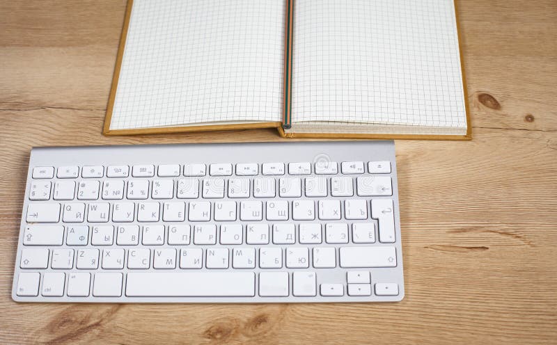 Computer Keyboard and Notebook are on the Table Stock Photo - Image of ...