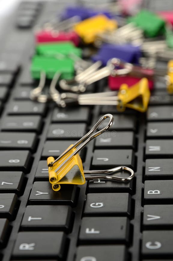 Computer Keyboard and Paper Clip Stock Image - Image of yellow ...