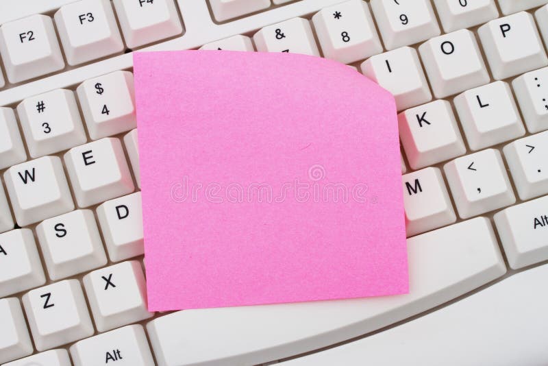 Computer Keyboard with a Pink Blank Sticky Note Stock Photo - Image of ...