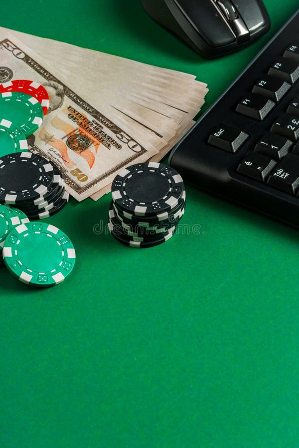 Computer Keyboard, Playing Cards, Dice, and Cash on Green Felt Tabletop ...