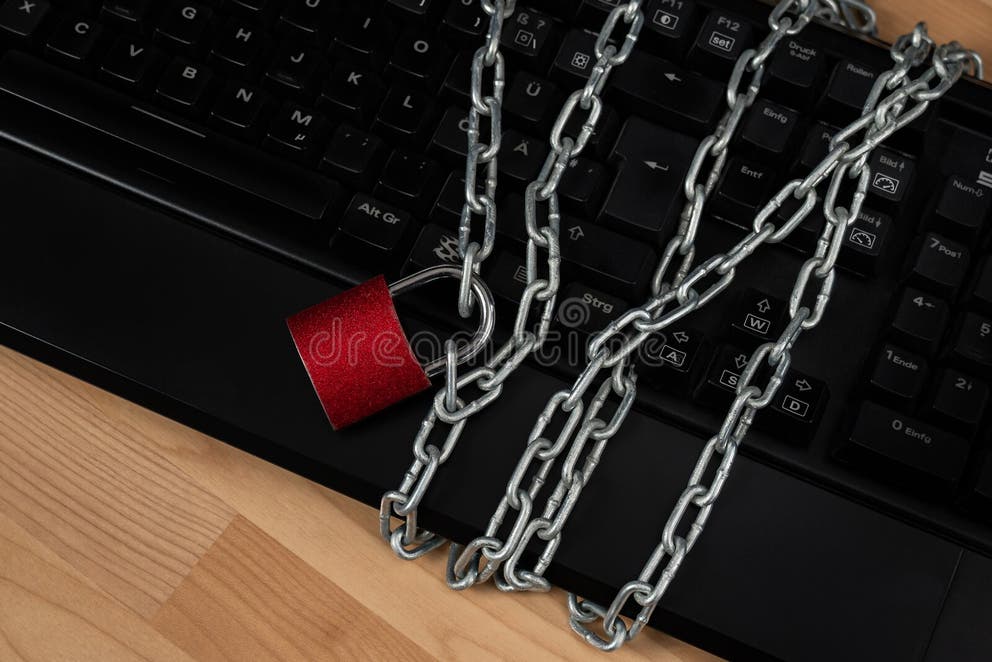 The Computer Keyboard is Wrapped with a Metal Chain with a Lock. Stock ...