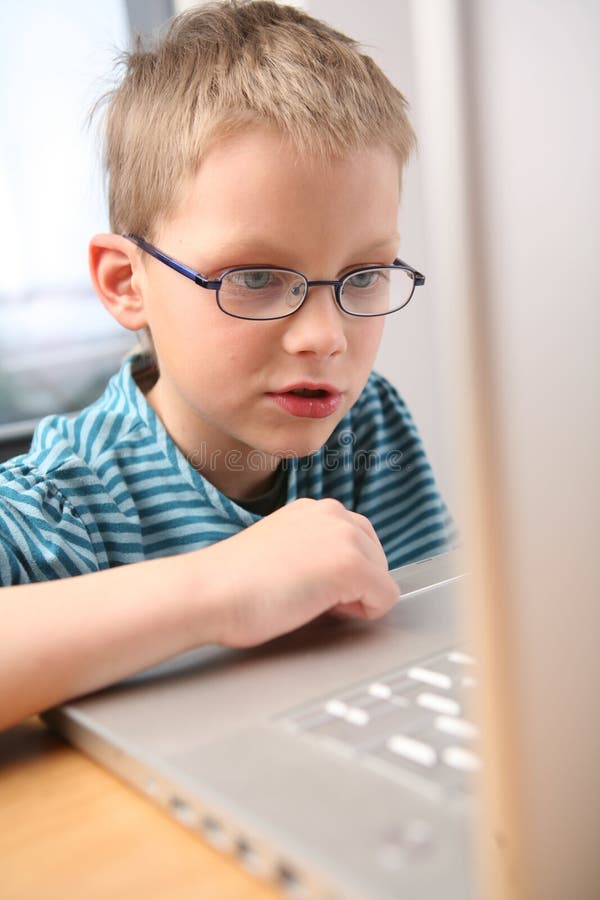 Child on computer stock image. Image of mouse, surf, intense - 2168505