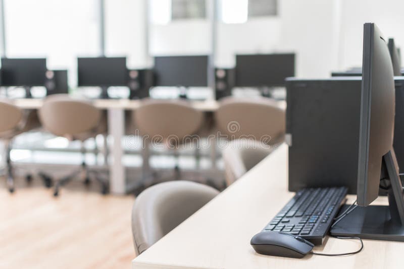 Computer Lab Blur Background with Pc Desktop Computer Machine in Blurry ...