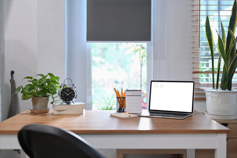 Laptop, Calendar, Notebook an Alarm Clock on Wooden Table. Stock Photo ...