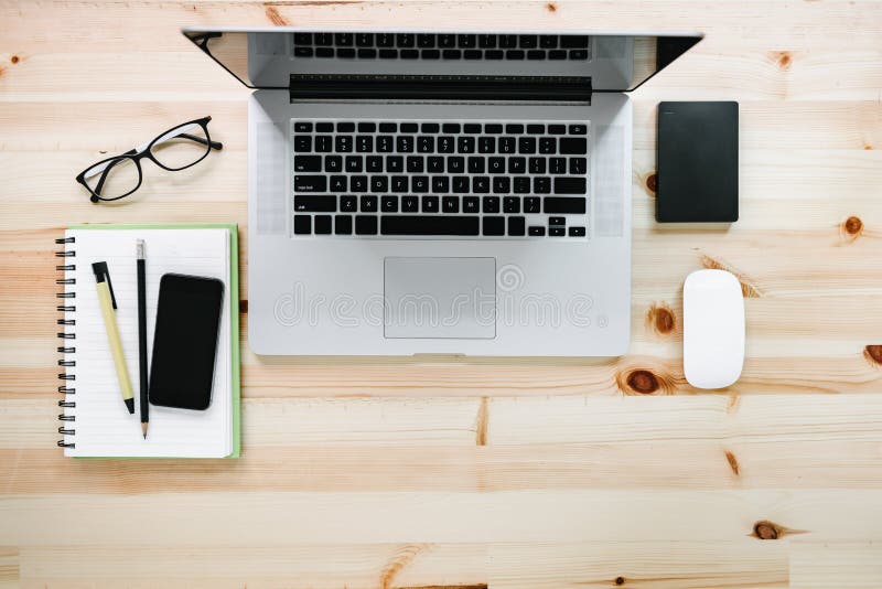 Laptop with Digital Tablet and Mobile Phone on Wooden Table Stock Image ...