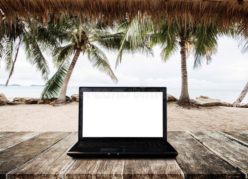 Computer Laptop on Wooden Table, at the Beach in Summer. Clipping Path ...
