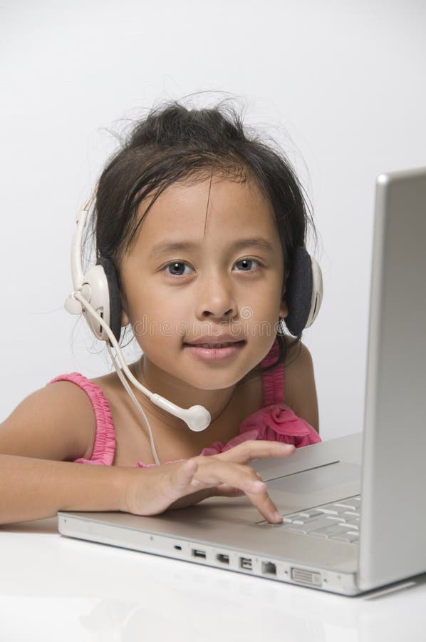 Young Chinese Boy Using Tablet Computer Stock Image - Image of sofa ...