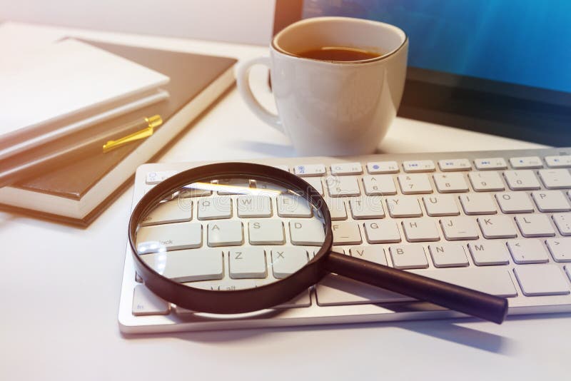 Computer with Magnifying Glass Stock Photo - Image of investigation ...