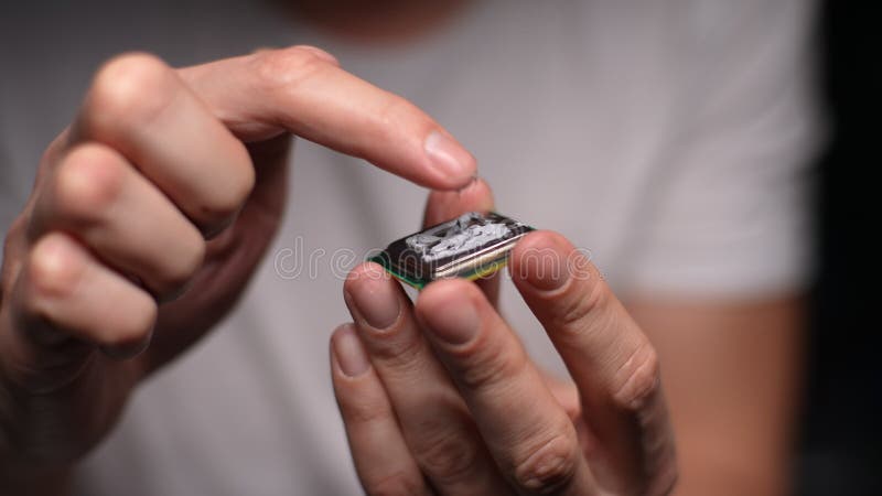 Computer Master Applying and Smearing New Thermal Paste To PC CPU ...