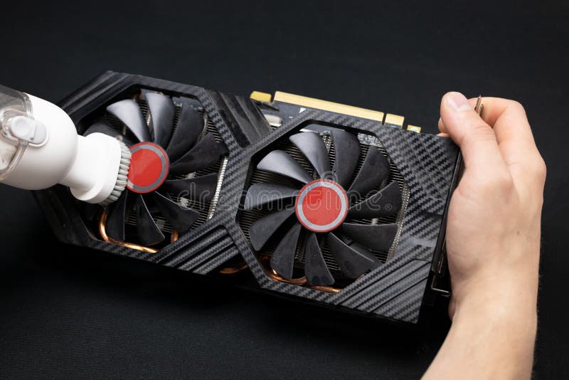 Computer Master Cleans the Video Card from Dust with a Vacuum Cleaner ...