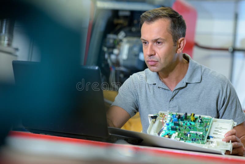 Computer Mechanical Engineer Assembling Pieces Stock Photo - Image of ...