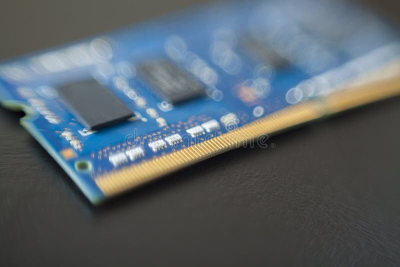 Computer Memory Chip Placed on Top of a Black Table. Connections and ...