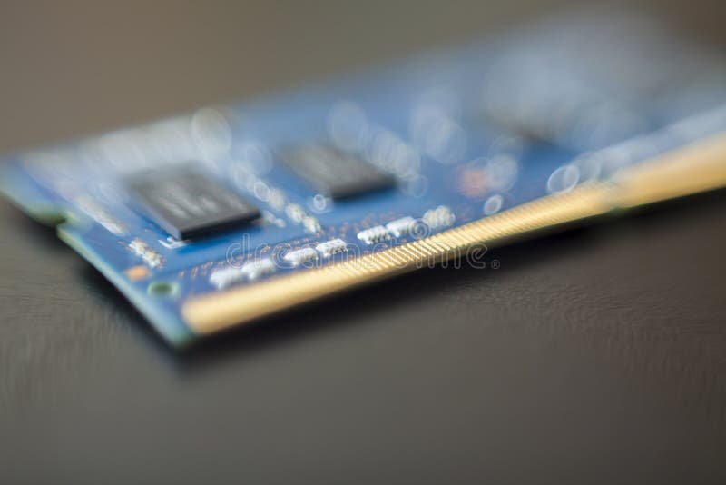 Computer Memory Chip Placed on Top of a Black Table. Connections and ...