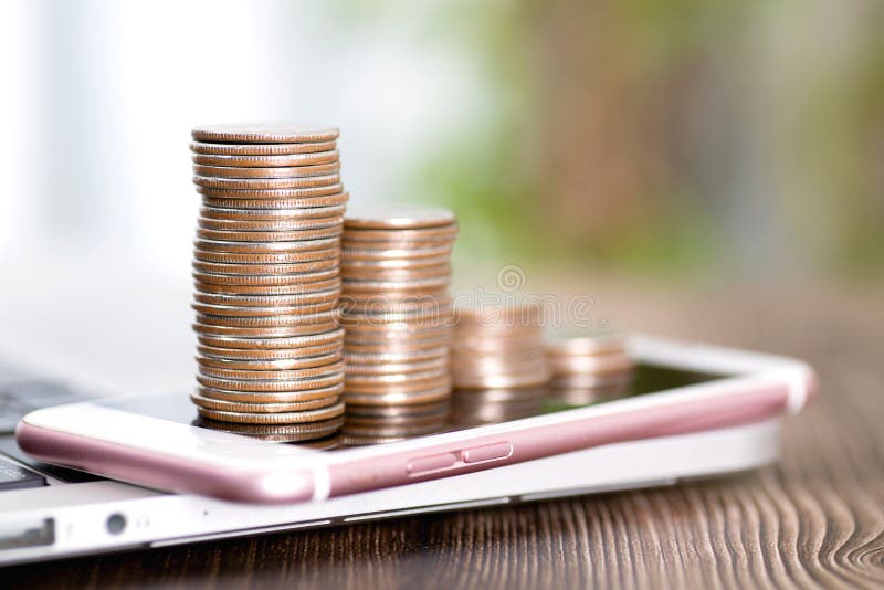 Computer and Mobile Phone and Dollar Coins Stock Photo - Image of phone ...