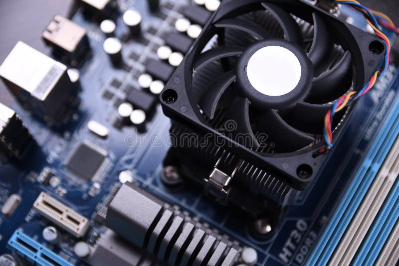 Computer Fan on Motherboard and Electronical Components Cpu Gpu Memory ...