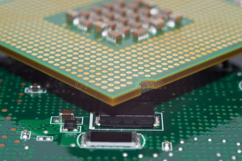 A Computer Motherboard with Half Stock Photo - Image of green, close ...