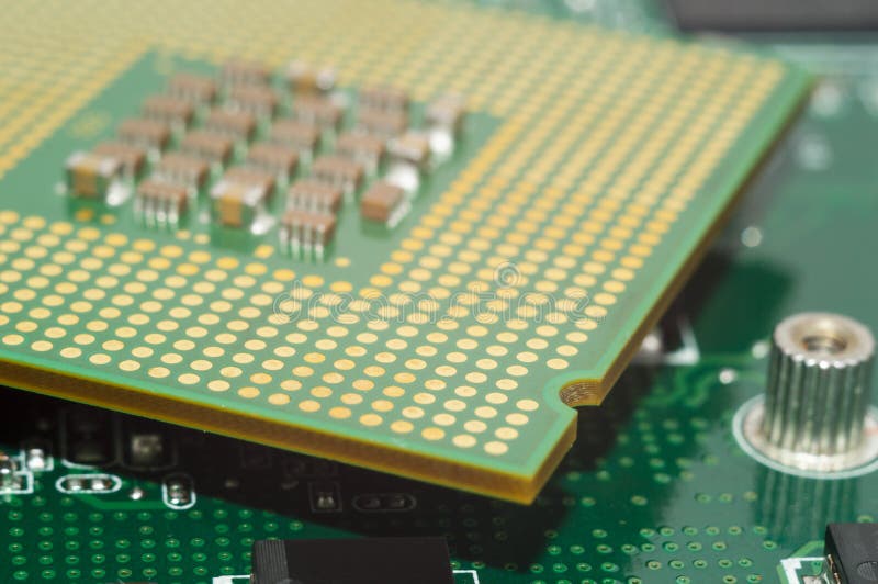 A Computer Motherboard with Half Stock Photo - Image of communication ...